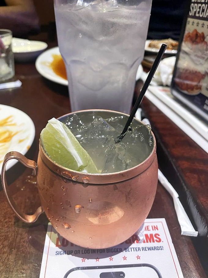 The Moscow Mule arrives like a copper-clad celebrity, lime wedge perched jauntily on the rim. Cold, refreshing, and ready for its close-up.