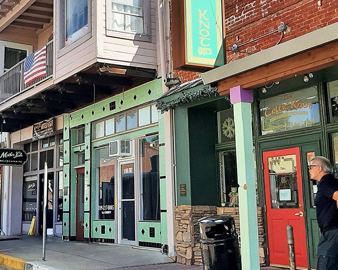 Splashes of turquoise and red doors brighten the historic streetscape, where businesses have personality instead of corporate blandness.