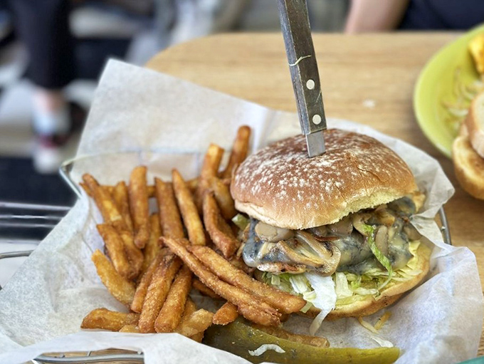 Burger perfection isn't complicated&mdash;it's this mushroom-topped masterpiece with hand-cut fries that would make your cardiologist wince and your taste buds applaud.