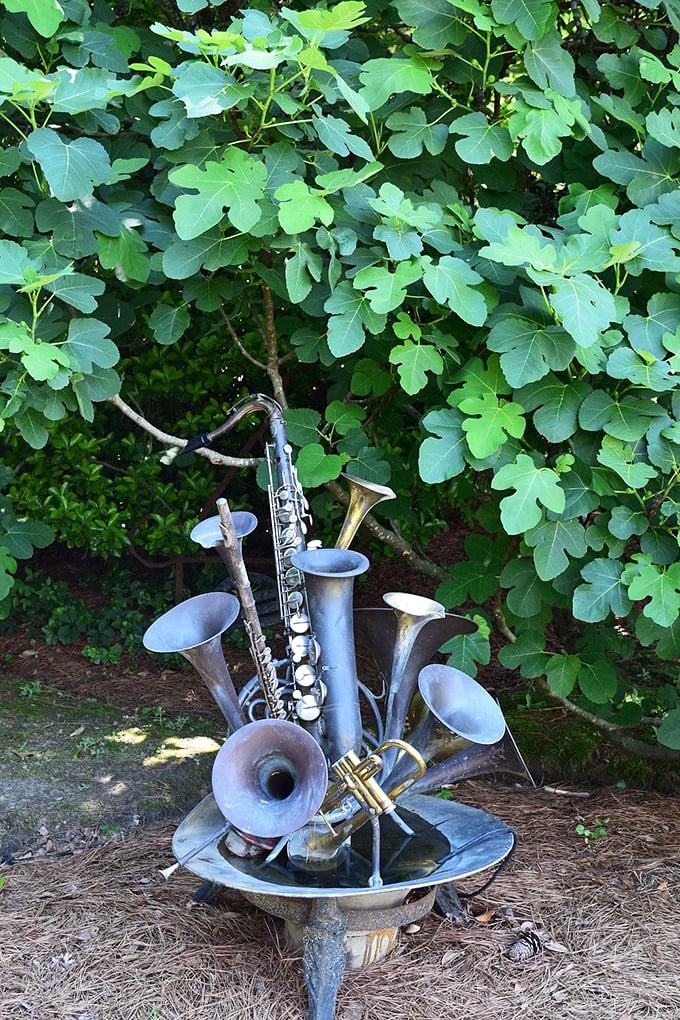 Who says gardens can't make music? This whimsical sculpture of instruments reminds us that creativity knows no boundaries, even in a garden.