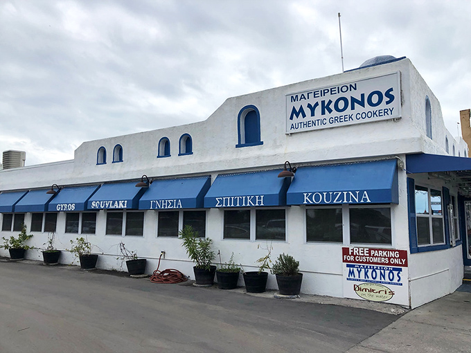 Mykonos restaurant's blue and white exterior transports diners straight to the Aegean&mdash;no passport required for this authentic Greek culinary journey.