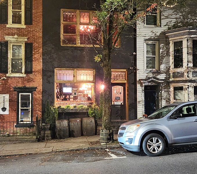 Nestled between neighboring buildings, this cozy establishment practically whispers "come in for a drink" as night falls on Jim Thorpe's historic streets.