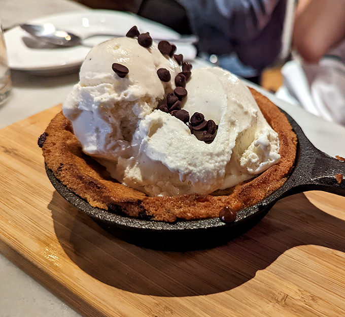 A skillet cookie crowned with vanilla ice cream and chocolate chips&mdash;proof that dessert is just as serious a business as meat here.