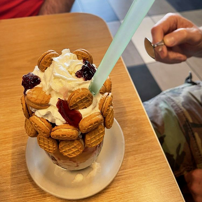 This isn't just dessert; it's a Nutter Butter paradise with whipped cream mountains and cookie continents waiting to be explored.