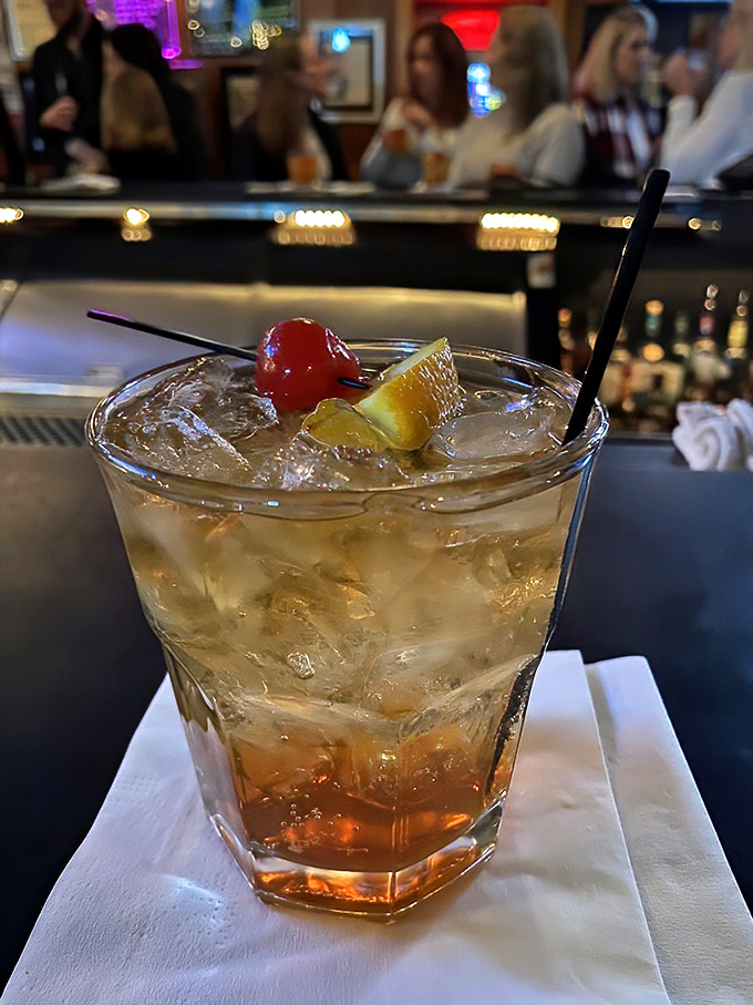 Wisconsin's unofficial state cocktail in its natural habitat&mdash;a brandy old fashioned sweet, complete with the ceremonial cherry and orange garnish.