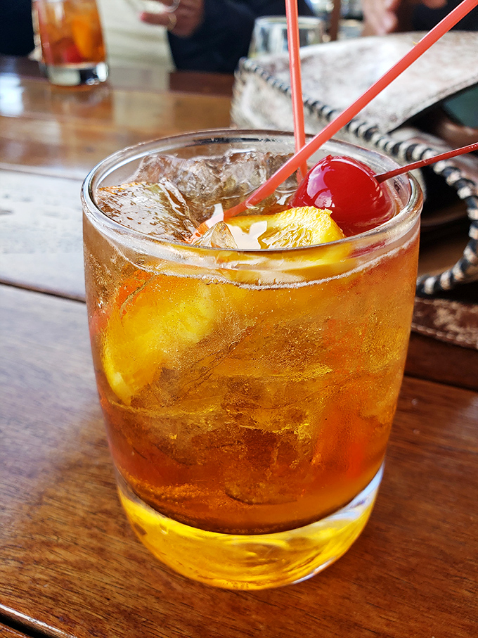 The Wisconsin handshake in liquid form—an old fashioned sweet with the proper fruit garnish. This isn't just a drink; it's a state tradition.