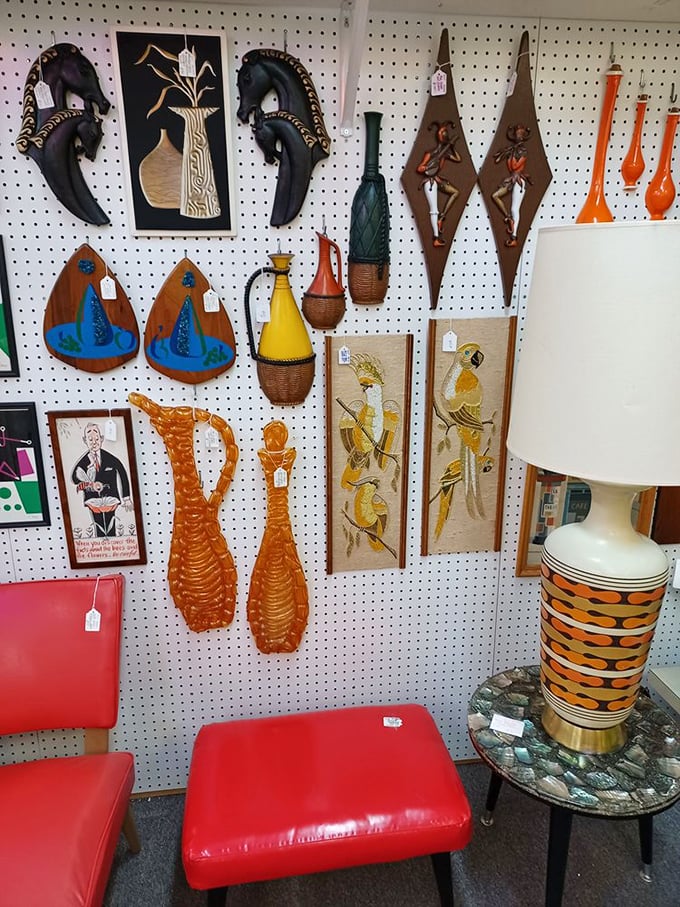 Mid-century wall art that would make Don Draper swoon. Those orange decanters are practically time machines to 1960s cocktail parties.