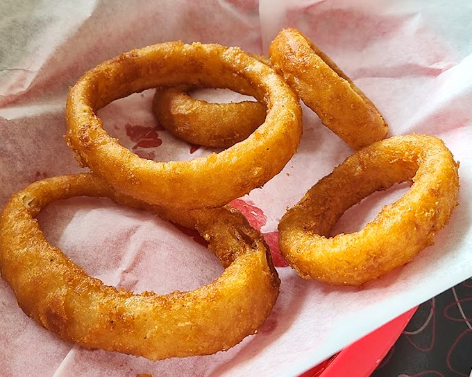 Onion rings with the structural integrity of Olympic medals and twice the satisfaction when you bite into them.