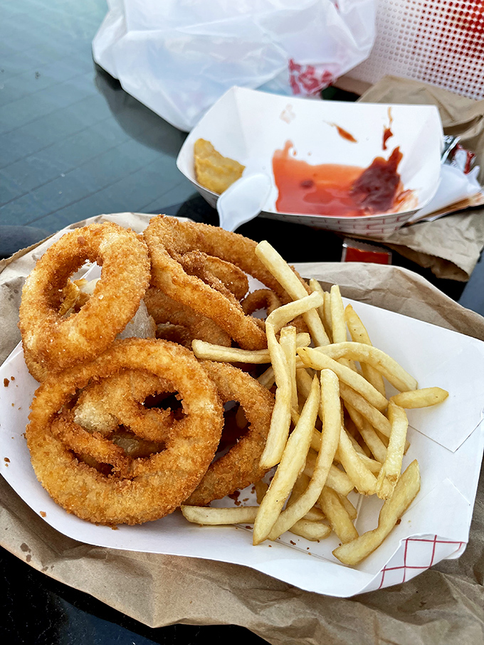 Onion rings and fries that don't need fancy dipping sauces or truffle oil&mdash;just the simple pleasure of hot, crispy sides that complement rather than compete.