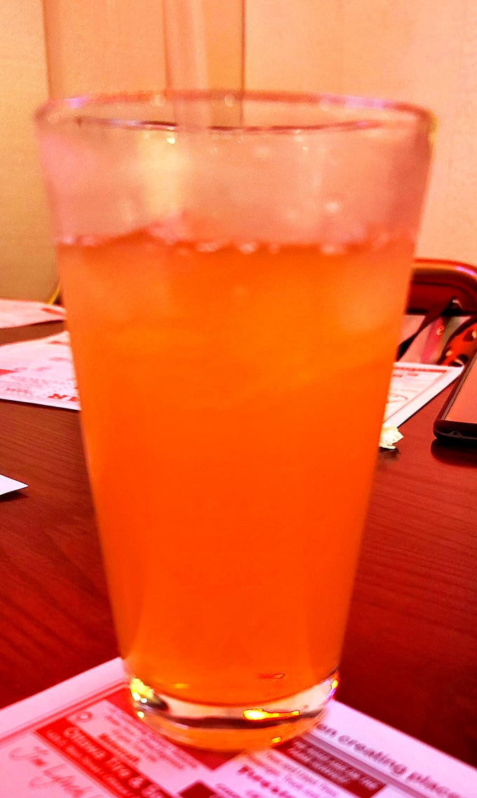 An ice-cold Orange Crush in a no-nonsense glass&mdash;sometimes the simplest pleasures are the ones we remember longest.