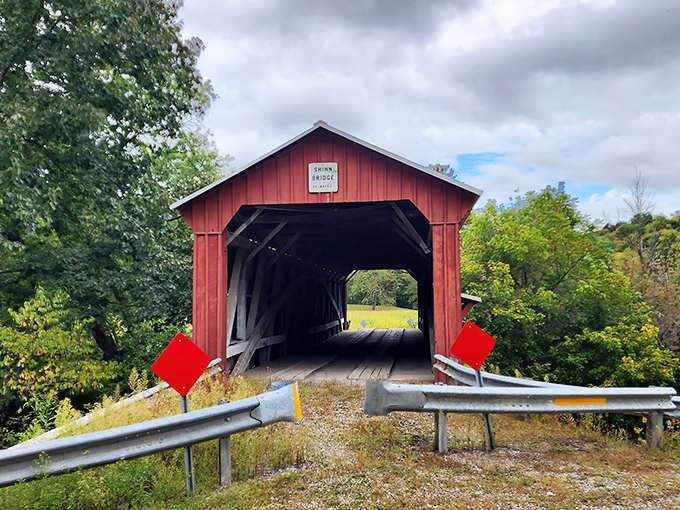 Those red diamond signs aren't just decoration&mdash;they're like traffic lights from another century, guiding travelers safely through this wooden time capsule.