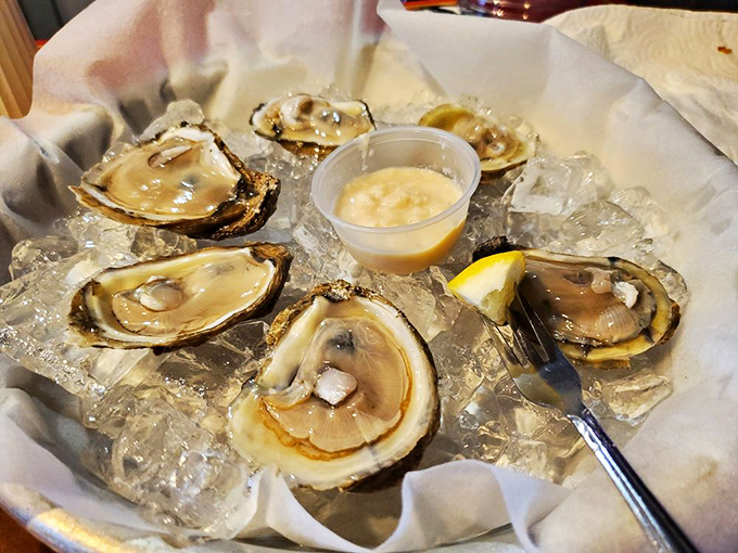 Fresh oysters on ice&mdash;nature's perfect appetizer that tastes like the ocean decided to send you a love letter.