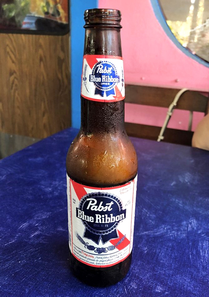 The universal sign of a good dive bar: ice-cold PBR on a blue table. Sometimes simple pleasures are the most satisfying.
