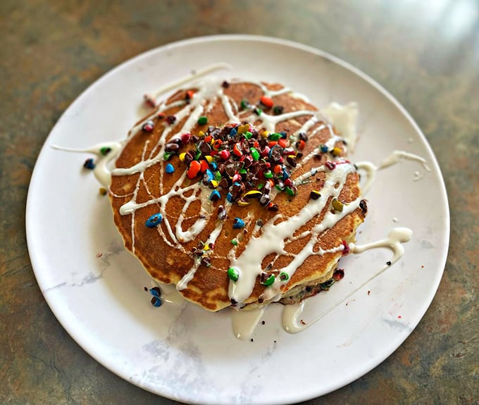 Pancakes wearing their party clothes – topped with icing, sprinkles, and enough joy to make Monday morning feel like Saturday afternoon.