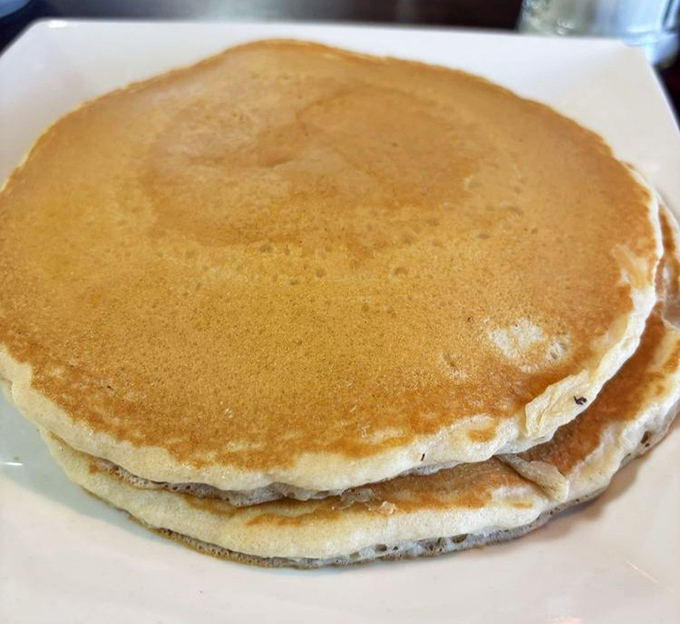 Pancakes so perfectly golden they belong in Fort Knox. Fluffy, tender, and ready for their maple syrup baptism.
