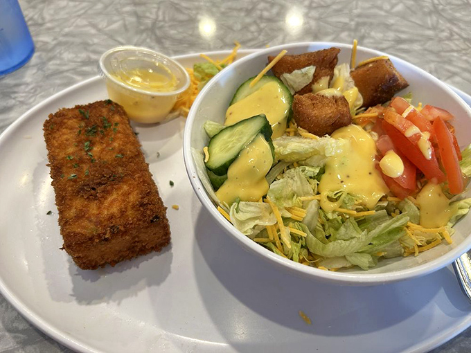 Crispy breaded goodness meets garden-fresh salad. The kind of lunch that makes you feel virtuous and indulgent all at once.