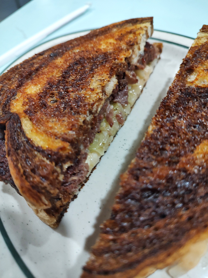 The patty melt&mdash;that brilliant marriage of burger and grilled cheese&mdash;toasted to the exact shade of brown that triggers immediate salivation.