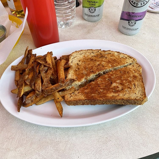 The patty melt &ndash; that magical hybrid where grilled cheese meets burger in a harmonious union that makes you wonder why all sandwiches aren't like this.