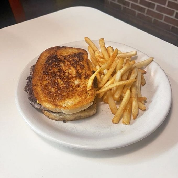 The patty melt: where burger meets grilled cheese in a beautiful union that makes you wonder why all great relationships can't be this simple.