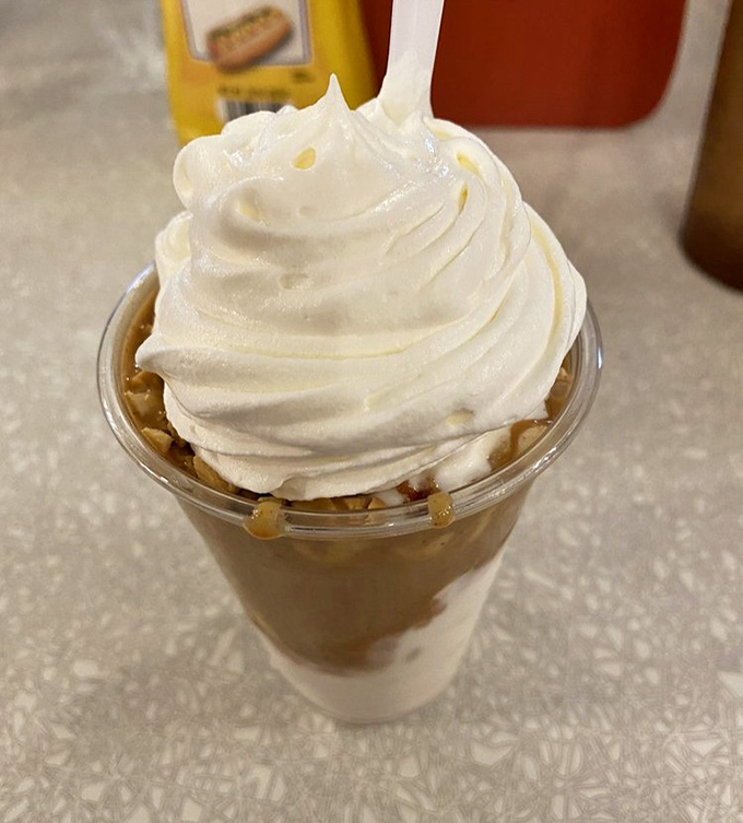 This peanut butter sundae doesn't just satisfy a craving&mdash;it creates a memory. That whipped cream mountain deserves its own topographical map.