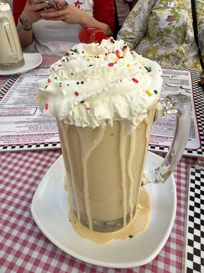 This milkshake doesn't just bring boys to the yard—it brings everyone with functioning taste buds. Whipped cream mountain with sprinkle confetti!