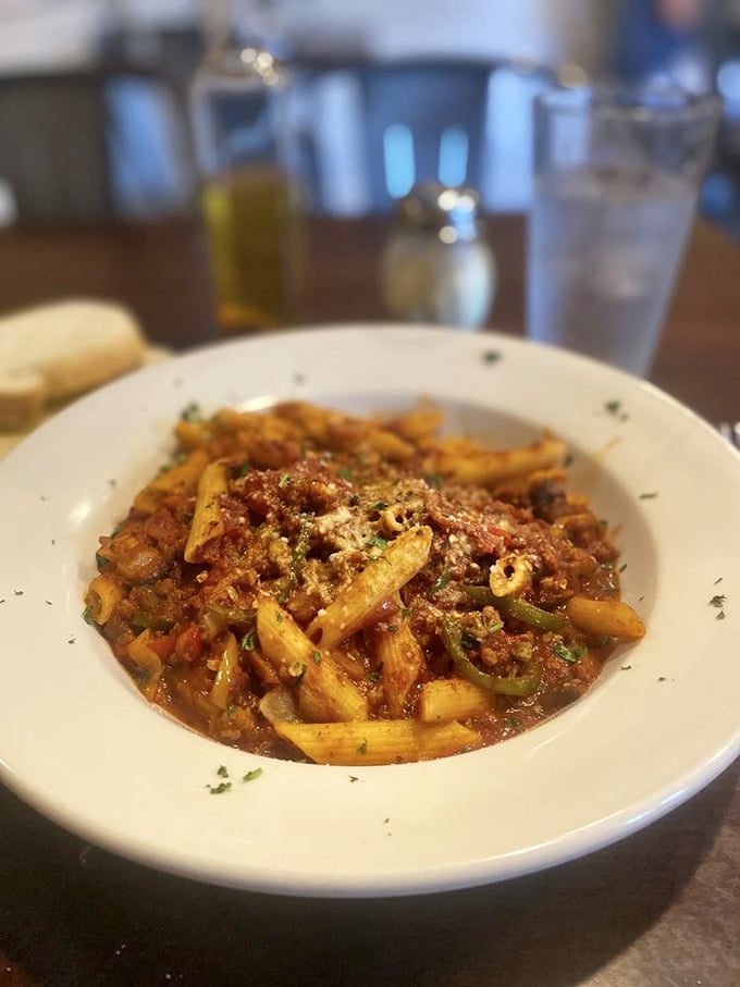 This isn't just pasta with sauce - it's penne that's found its soulmate in a vibrant, slightly spicy tomato bath that demands to be savored.