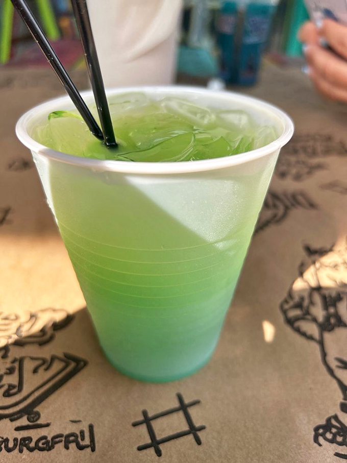 Electric blue meets tropical green in a glass. This isn't just a drink&mdash;it's South Carolina summer distilled into liquid refreshment.