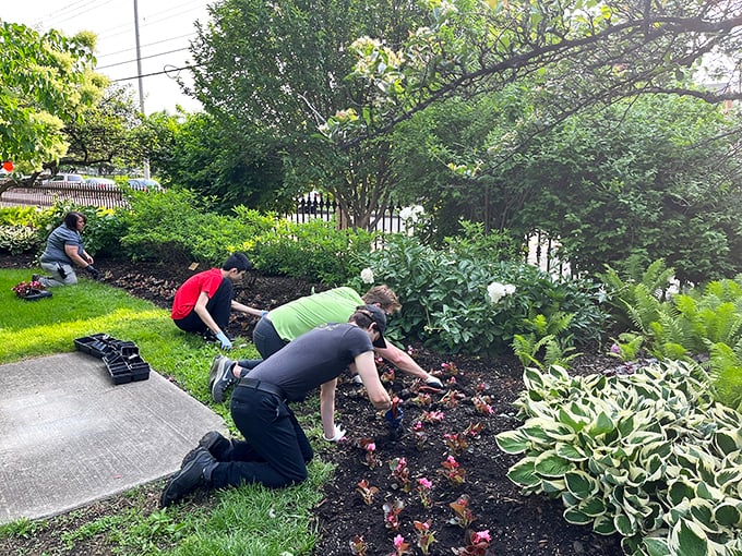 Garden volunteers hard at work&mdash;the unsung heroes who ensure this living artwork remains picture-perfect through every season.