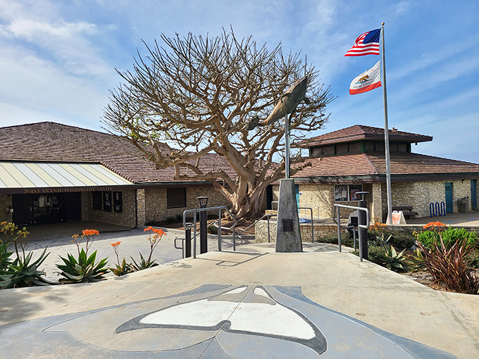 The Interpretive Center welcomes visitors with California flags snapping in the breeze and native landscaping that says, "Yes, you're definitely not in Kansas anymore."