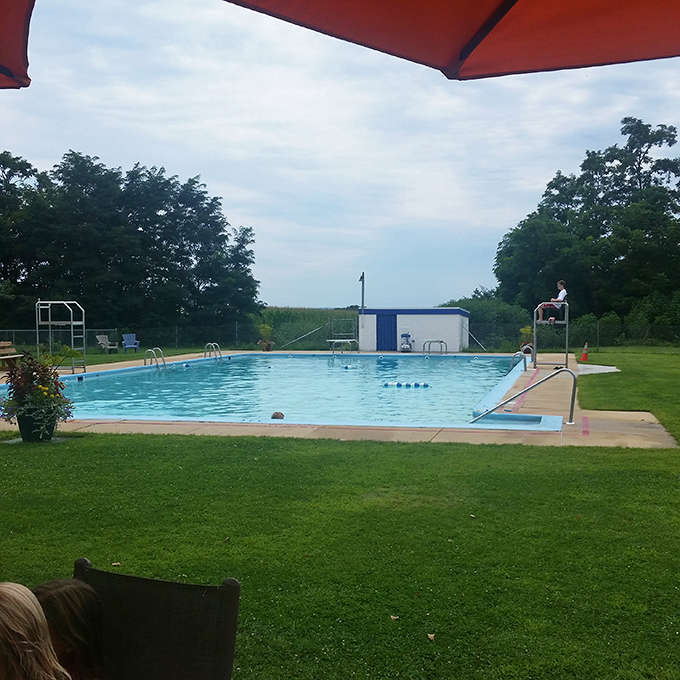 Strasburg's community pool shimmers under Pennsylvania summer skies, offering a refreshing respite after a day of exploring Amish country's treasures.
