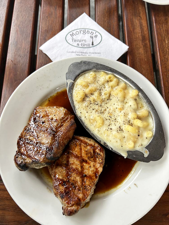 Pork chops and mac & cheese – the dynamic duo of comfort that proves sometimes the best things in life come on the same plate.