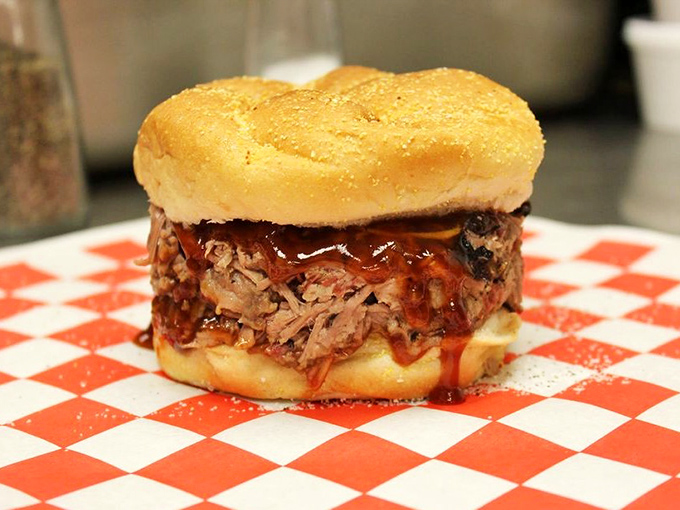 This isn't just a sandwich—it's pulled pork's greatest ambition realized between two pillowy buns, ready for its close-up.