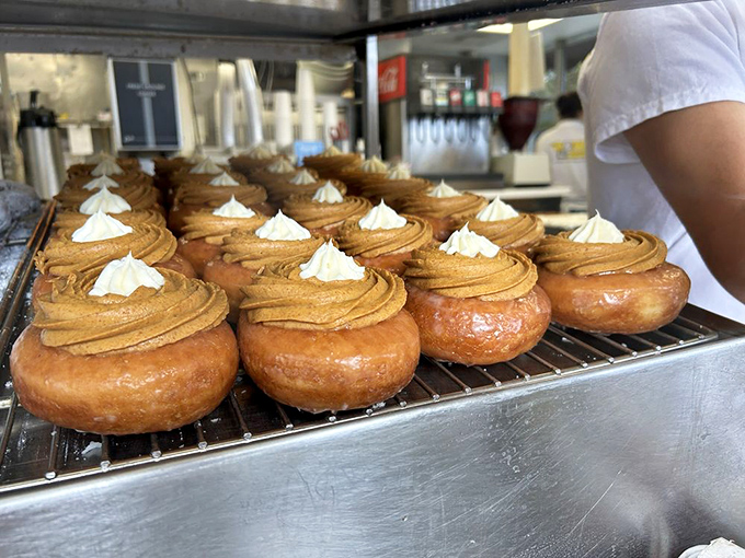 Pumpkin cream donuts that would make Cinderella's fairy godmother jealous. Midnight's approaching, but these won't turn back into ordinary pastries.