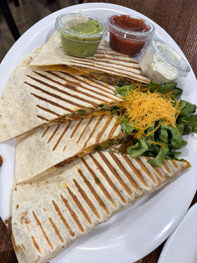 Quesadillas with the works &ndash; where Mexican-inspired comfort meets Midwestern abundance. That grill mark pattern is practically hypnotic.