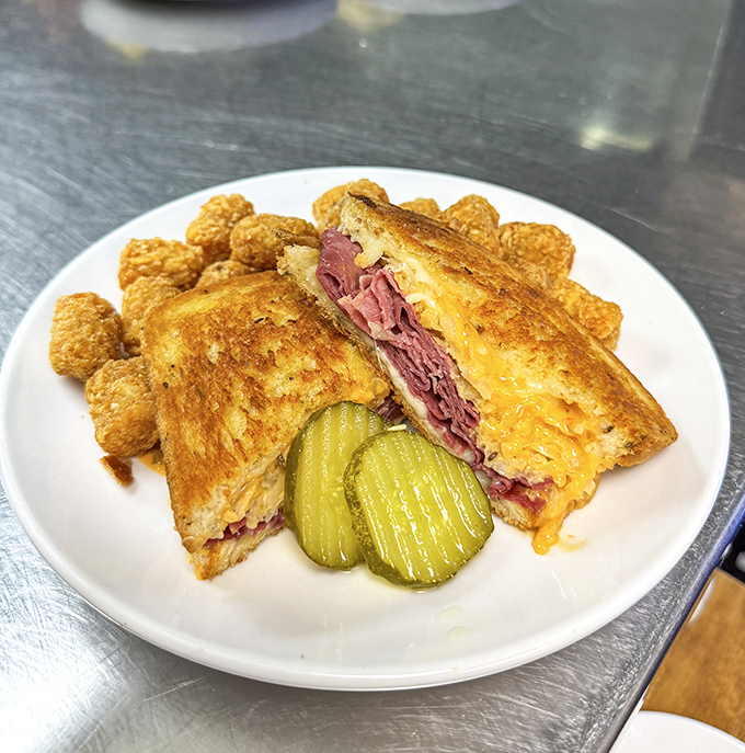 A Reuben sandwich that would make New York delis nervous, served with tater tots because Florida knows how to improve on perfection.