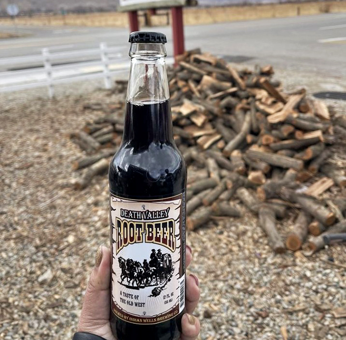 Nothing complements barbecue quite like an ice-cold root beer, especially with a pile of smoking wood in the background. Pure Americana.