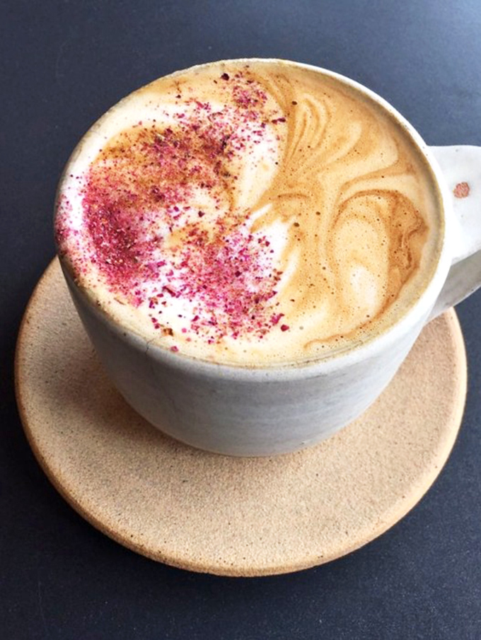 Coffee as art form&mdash;this rose petal latte delivers both caffeine and beauty. The perfect companion to cut through donut sweetness with style.