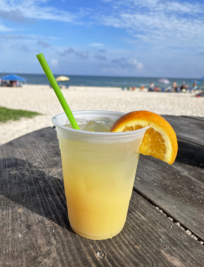 Sunshine in a glass! Nothing says "I'm officially on island time" like this citrus-kissed rum runner with an orange garnish.