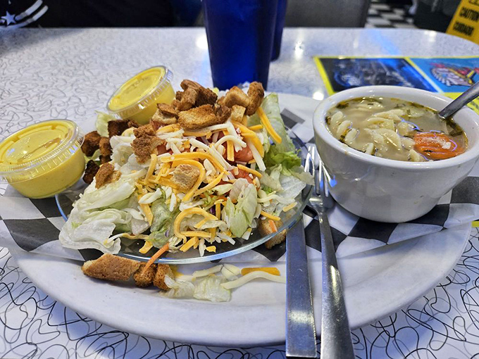 A salad that doesn't apologize for being healthy, proudly escorted by soup that's been simmering since before your morning alarm went off.