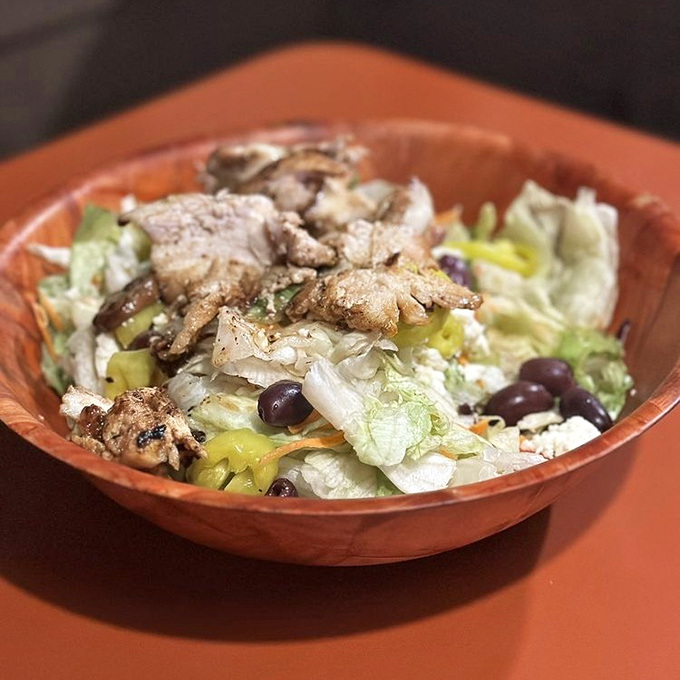 Even the salads at Thurman's refuse to be dainty. This wooden bowl carries enough protein and veggies to fuel your next adventure.