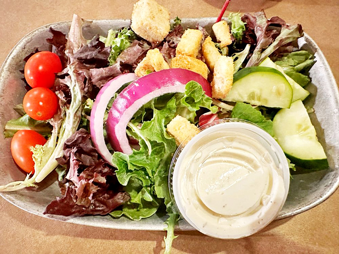 A salad at a fish house is like bringing an umbrella to the desert &ndash; technically unnecessary, but surprisingly refreshing when you need a break from all that delicious fried goodness.