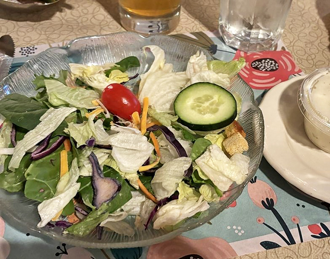 Even the salad knows its supporting role in this meat-centric drama&mdash;fresh, crisp, and patiently waiting for its moment between steak bites.