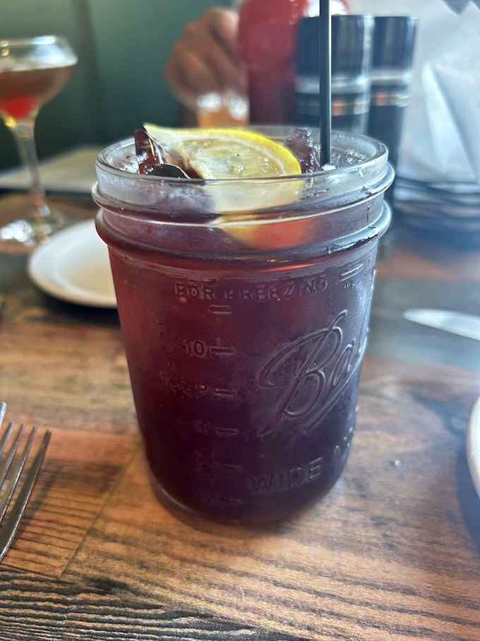 Mason jar sangria—because sometimes the perfect accompaniment to fresh seafood is fruit that's taken a delightful swim in wine.
