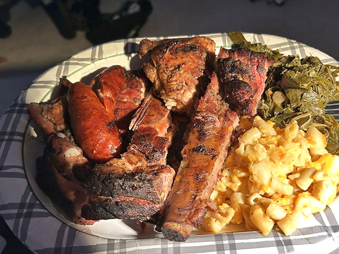 A plate that answers the eternal question: "Why choose one meat when you can have three?" The mac and cheese looks like it's plotting to steal the show