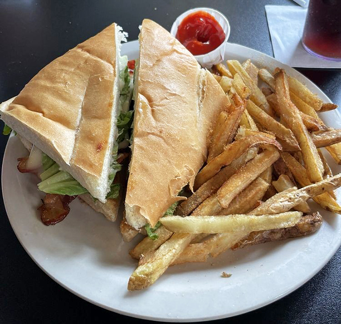 Sandwiches here aren't an afterthought&mdash;they're architectural marvels of flavor, served with hand-cut fries that would make a potato proud.
