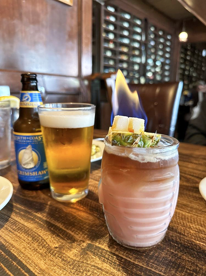 Nothing says "vacation mode activated" quite like a craft beer and a cocktail with actual flames. Fire and alcohol&mdash;what could possibly go wrong?