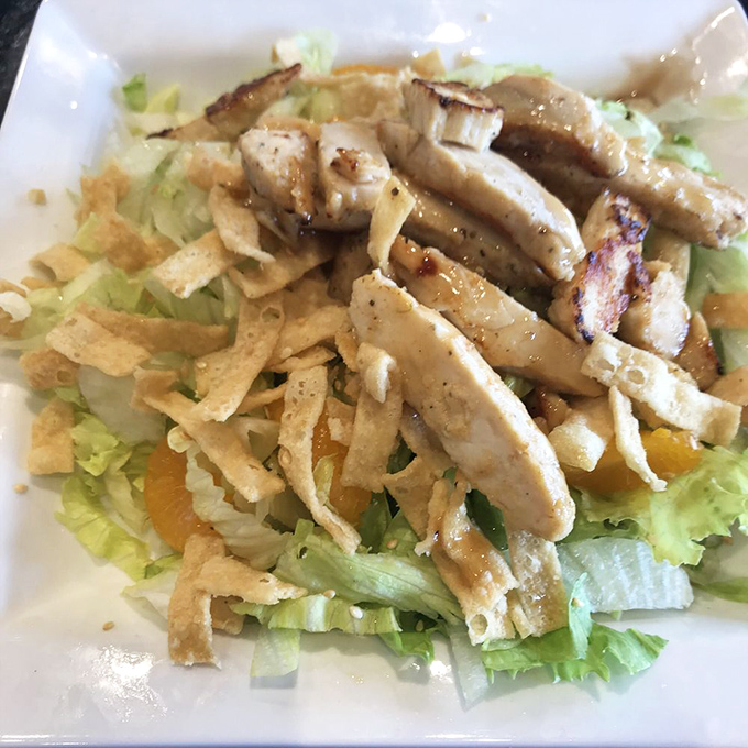 Fresh greens meet tender chicken in a salad that proves healthy can be absolutely delicious.