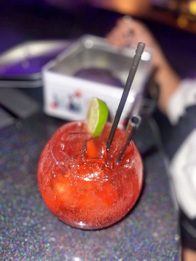 This vibrant red cocktail with its lime garnish looks like it could either cure what ails you or grant magical powers. Maybe both!