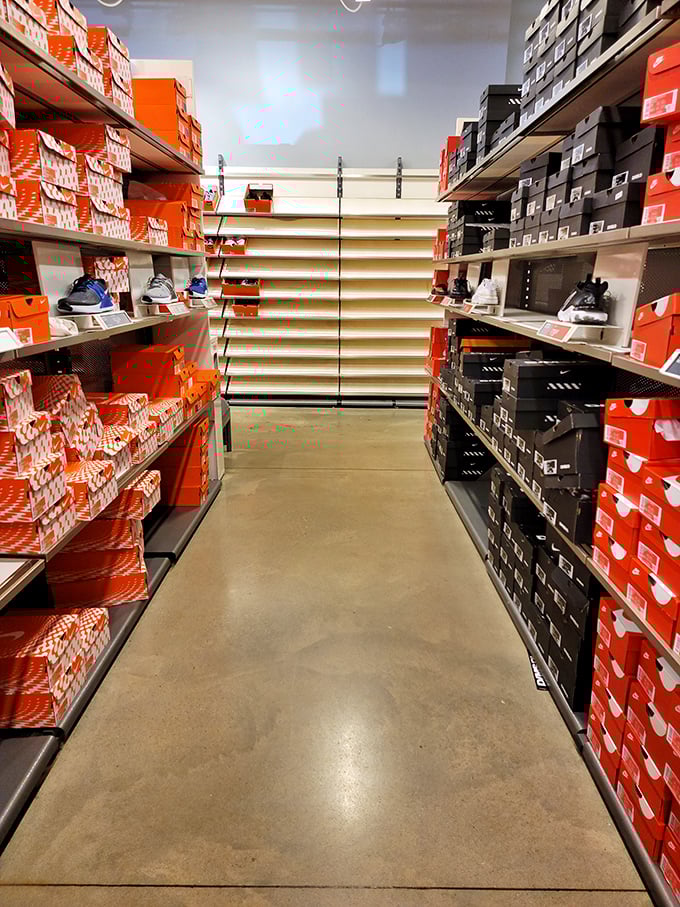 The promised land of footwear &ndash; where Nike boxes stack like orange building blocks of athletic aspiration. Your feet are already celebrating.