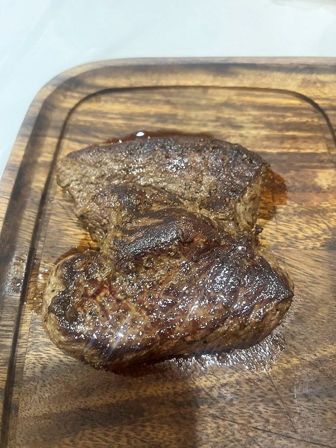 Even the steak gets the star treatment at Juicy Crab. This sizzling sirloin proves they've mastered land as thoroughly as sea.